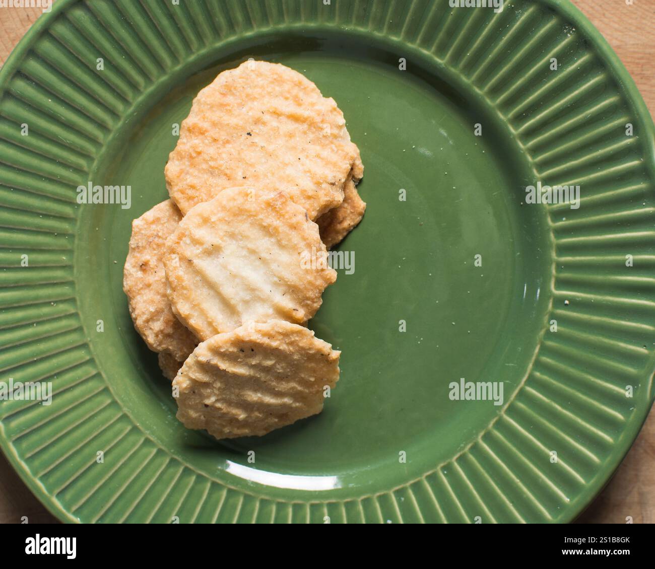 Overhead view of gurundi chips, top view of nigerian coconut biscuits ...