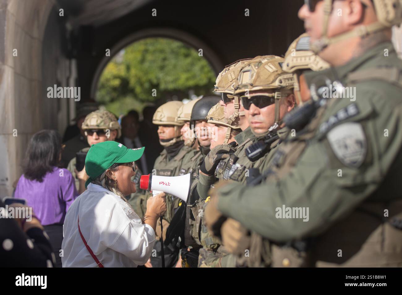 San Juan, USA. 02nd Jan, 2025. Environmental activists face off with ...