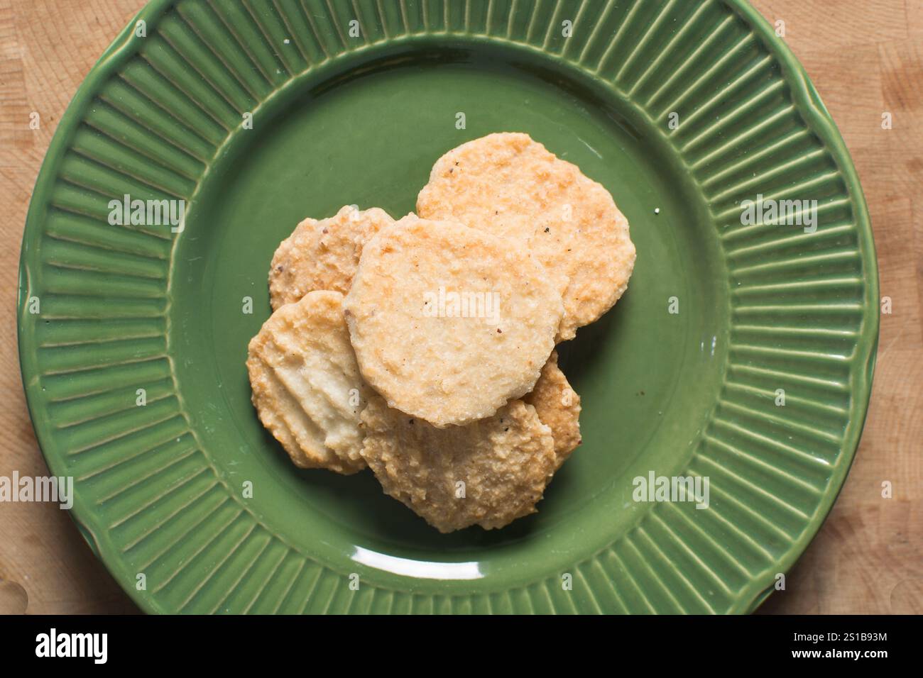 Overhead view of gurundi chips, top view of nigerian coconut biscuits ...
