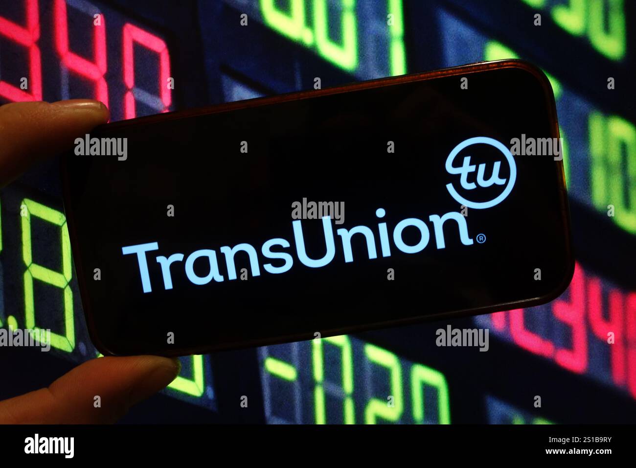 In this photo illustration, the TransUnion company logo is seen ...