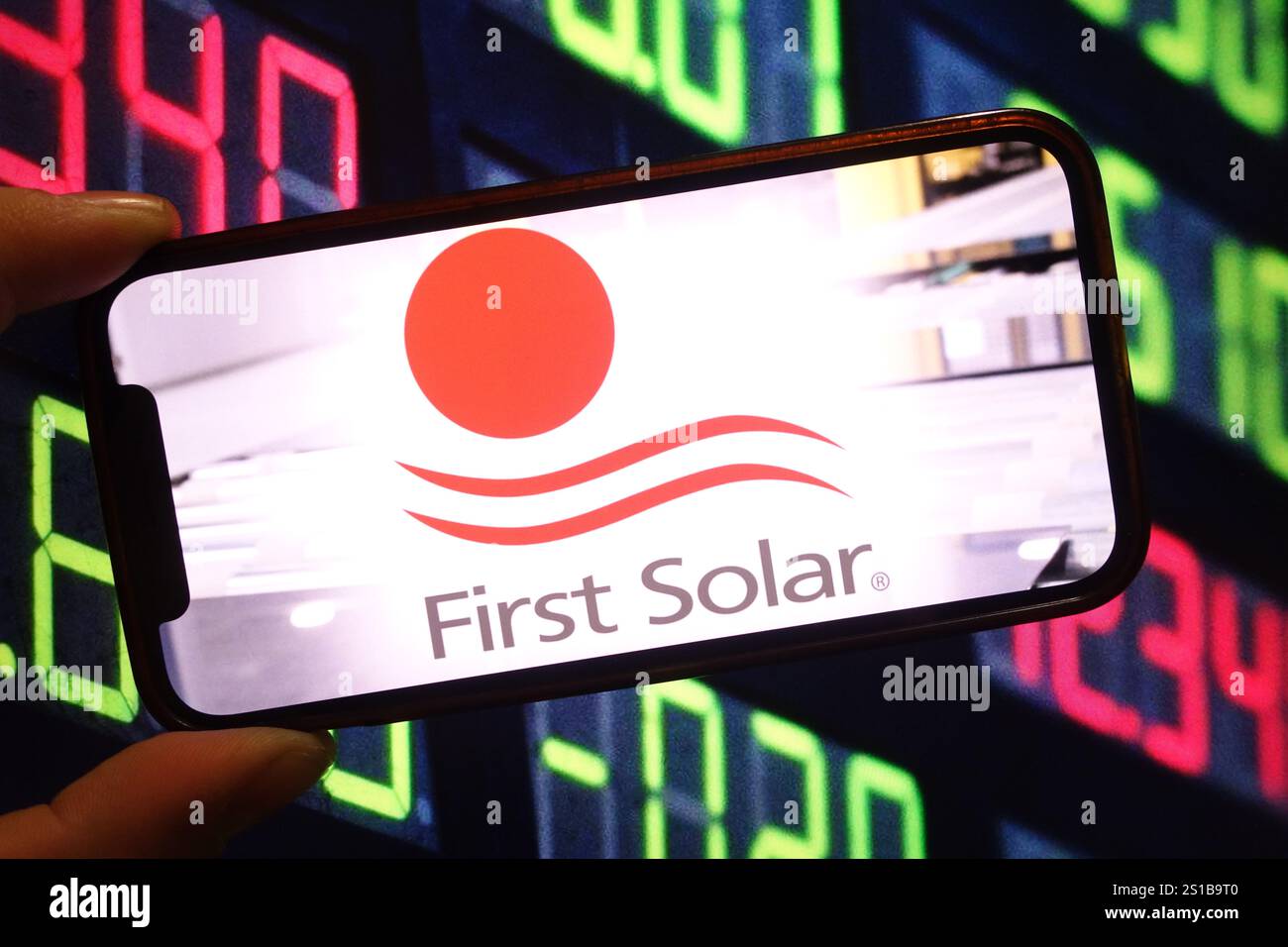 In this photo illustration, the First Solar company logo is seen ...