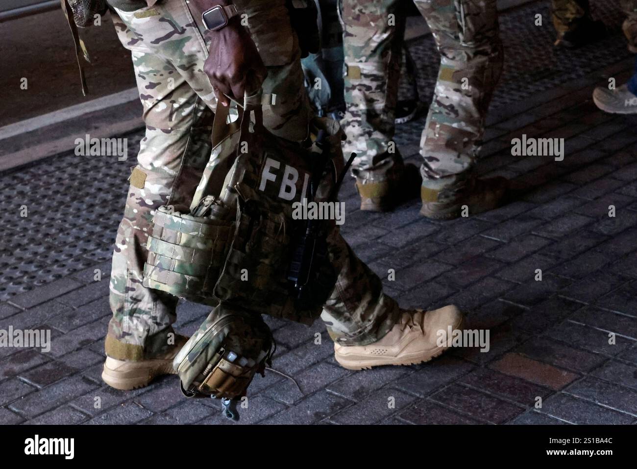 FBI personnel arrive at the Caesars Superdome ahead of the Sugar Bowl ...