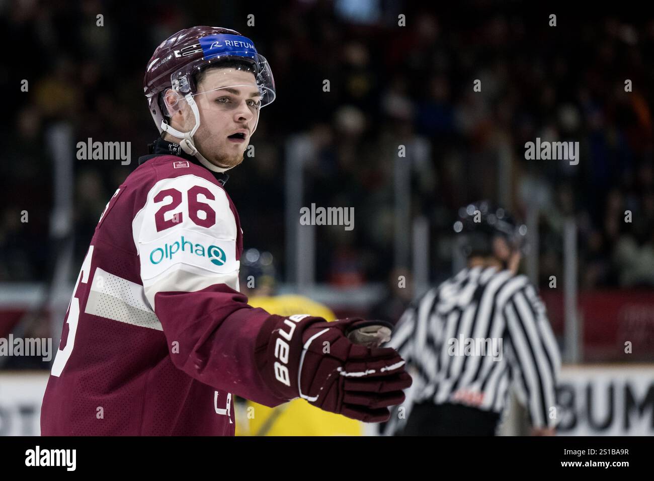 Oskars Briedis of, Latvia. , . during the 2025 IIHF World Junior ...