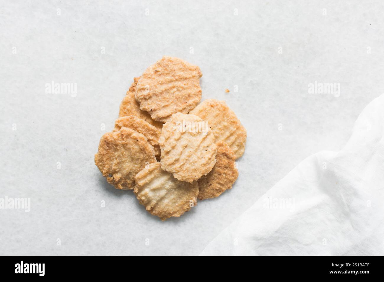 Overhead view of gurundi chips, top view of nigerian coconut biscuits ...