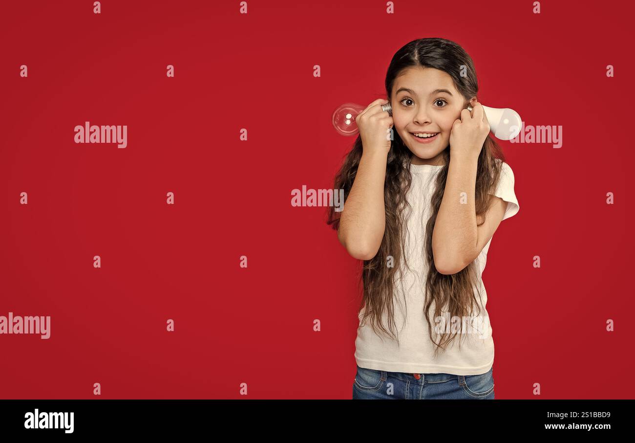 teen girl has solution isolated on red, copy space. teen girl has ...