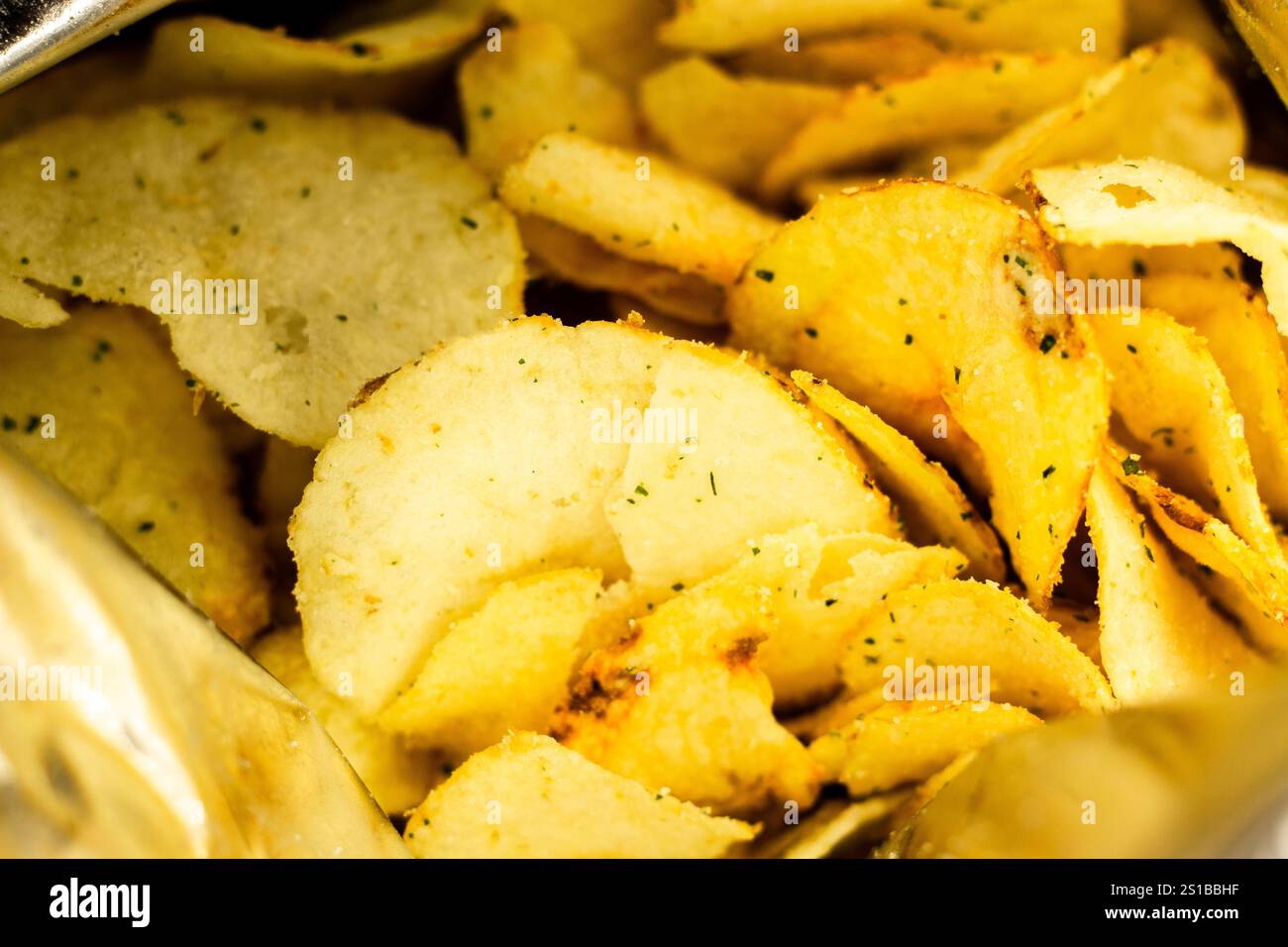 Bag with potato chips. Close up of crispy chips. Crunchy snack in ...