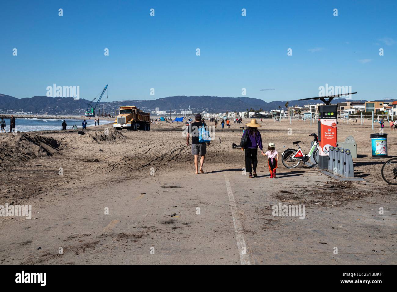 Beach sand overflows bike path after very high tides, Playa Del Rey ...