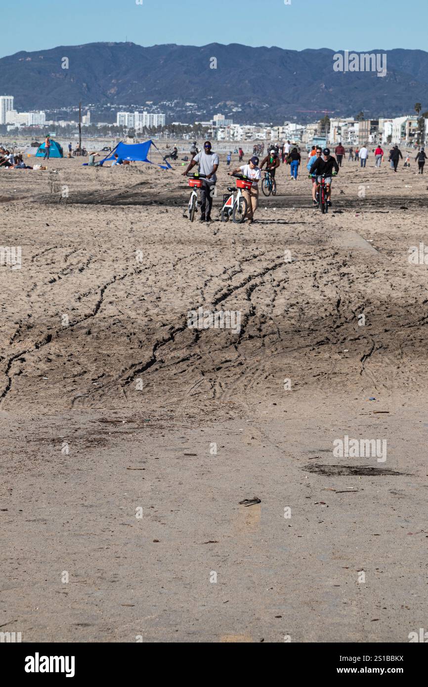 Beach sand overflows bike path after very high tides, Playa Del Rey ...