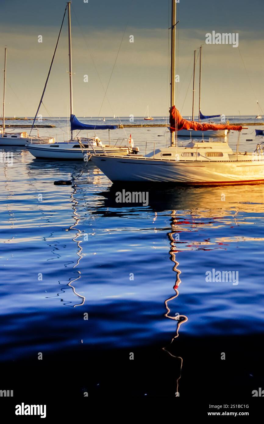 Boats reflection on lake Ontario, Canada Stock Photo - Alamy