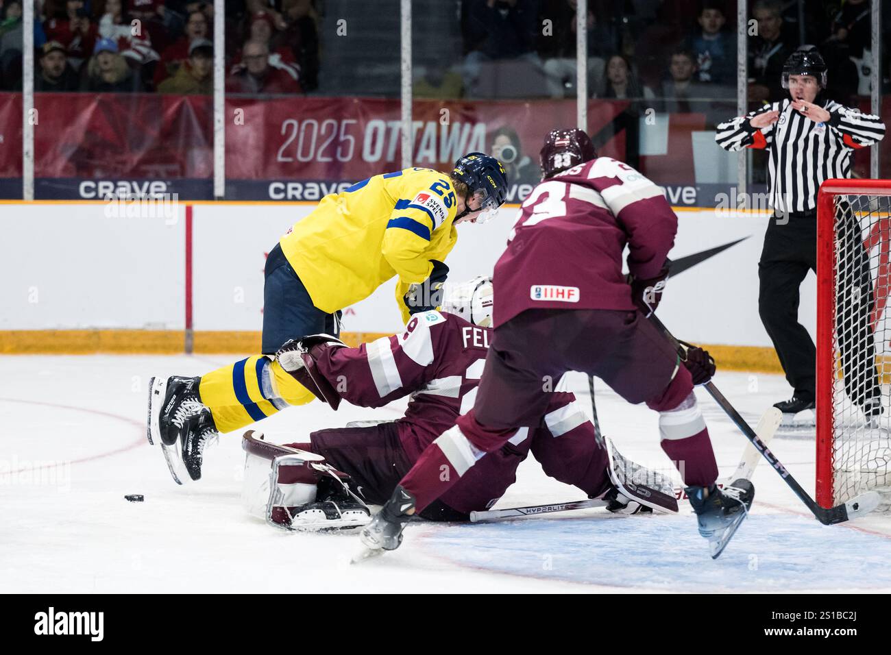 Otto Stenberg of, Sweden. , . and goaltender Linards Feldbergs of ...