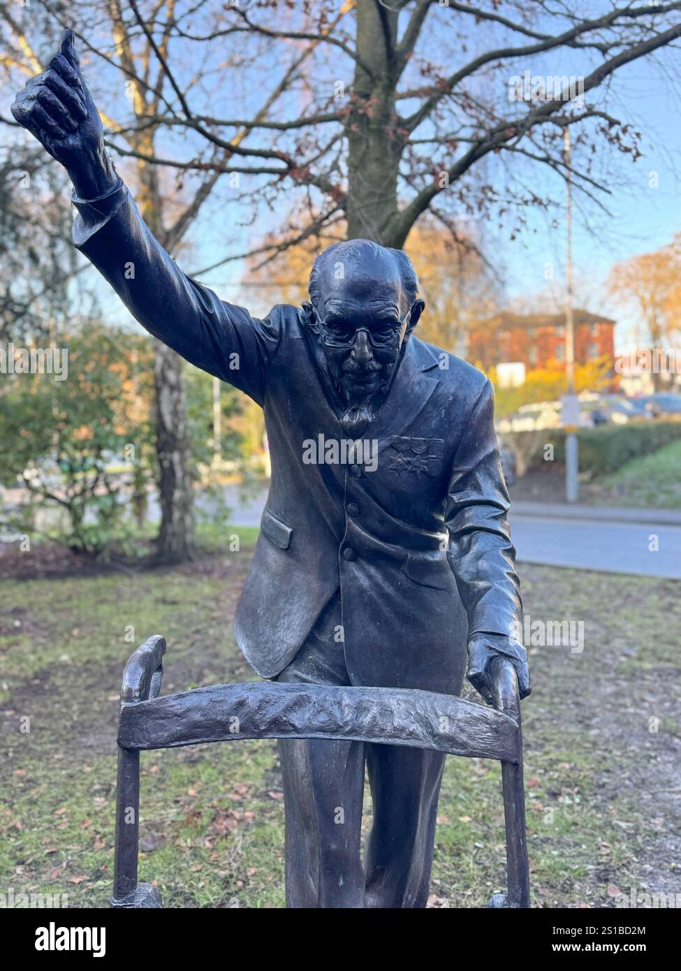 A bronze statue of Captain Sir Tom Moore, a British army captain and fundraiser, donated to ...