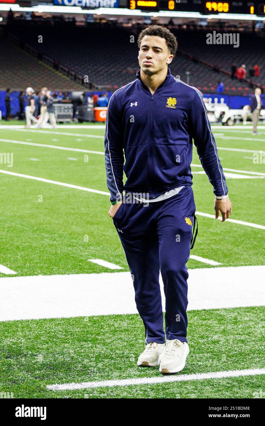 New Orleans, Louisiana, USA. 02nd Jan, 2025. Notre Dame wide receiver Jordan Faison (6) walks ...