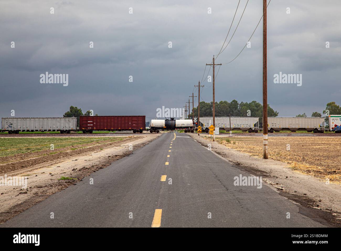 Freight train crossing, Corcoran, Kings County, California Stock Photo ...