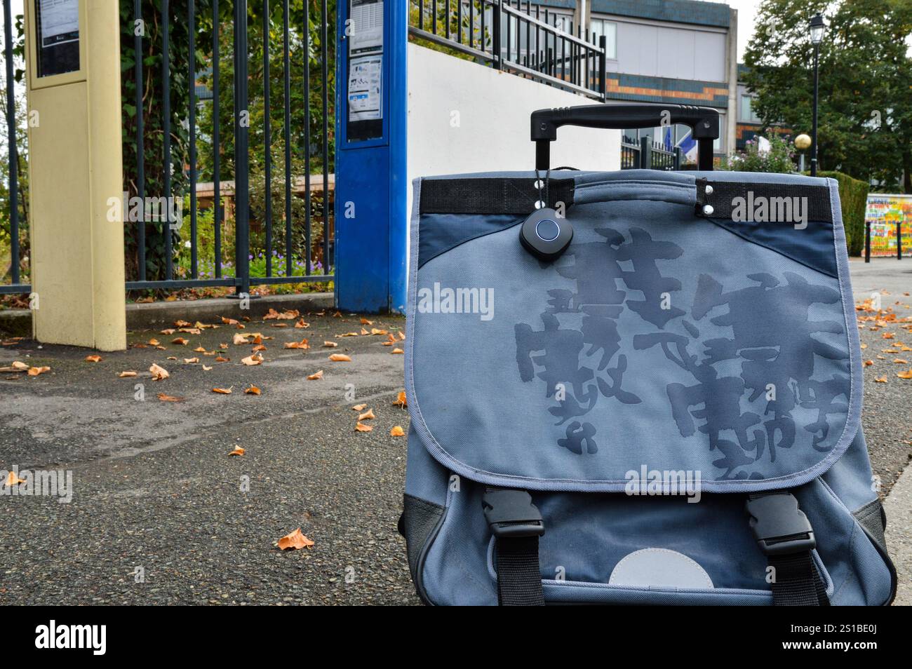A gps tracker on a child’s school bag for real-time tracking Stock ...