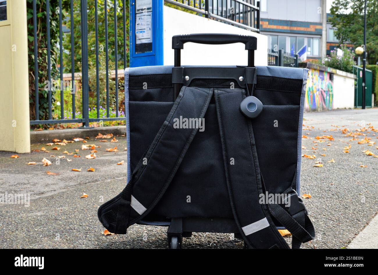 A gps tracker on a child’s school bag for real-time tracking Stock ...