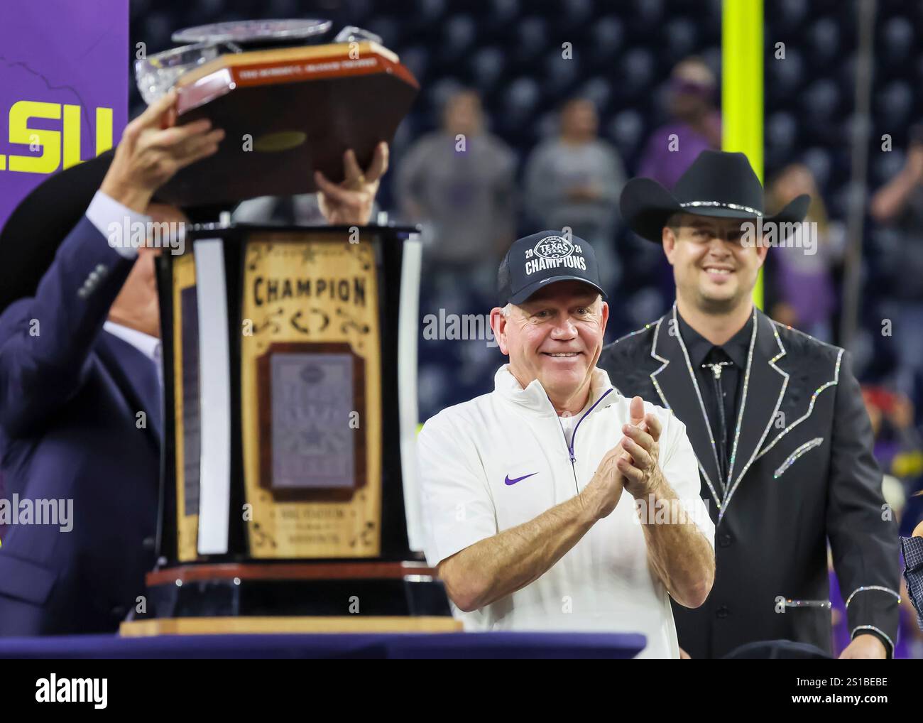 HOUSTON, TX - DECEMBER 31: LSU Tigers head coach Brian Kelly smiles as ...