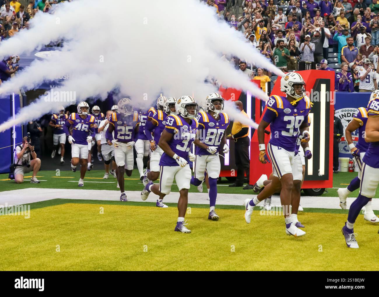 HOUSTON, TX - DECEMBER 31: LSU Tigers enter the field during the football game between the ...