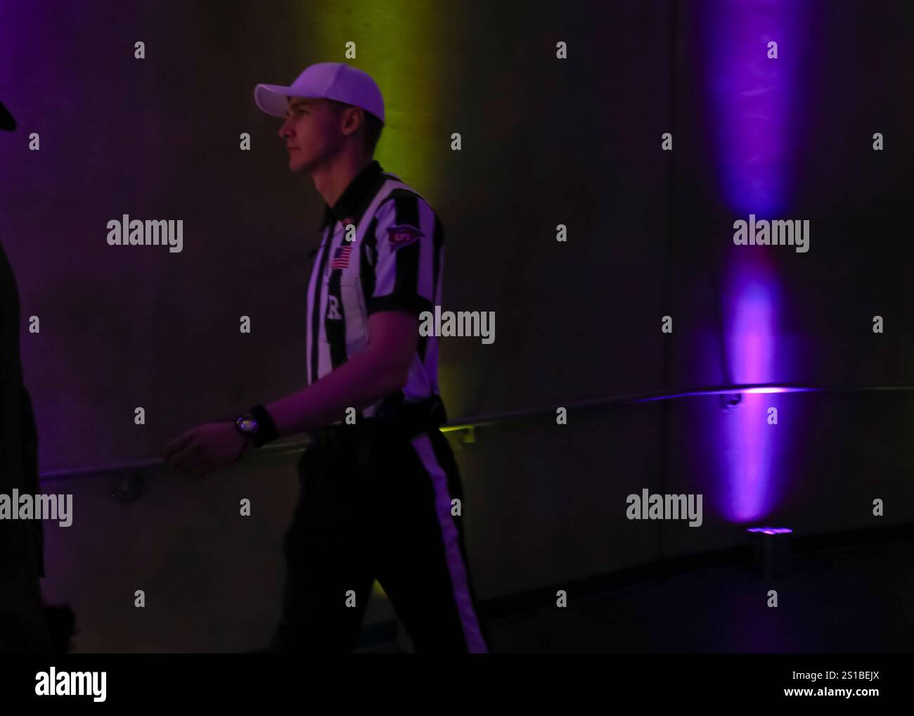 HOUSTON, TX - DECEMBER 31: Referee Justin Elliott walks down the tunnel ...