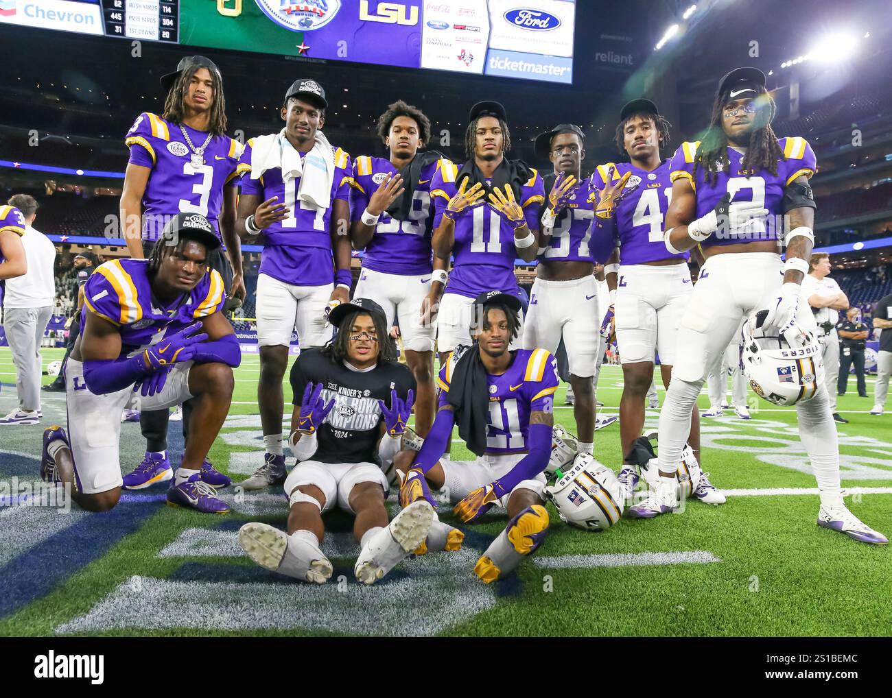 HOUSTON, TX - DECEMBER 31: LSU Tigers players pose for group photo after winning 44-31 during ...