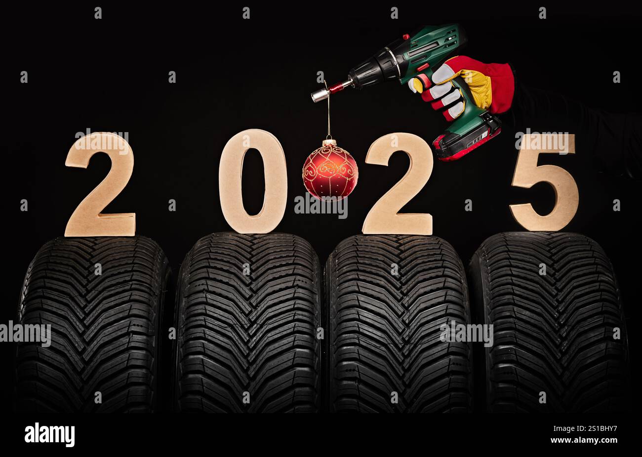 Winter car tires, big wheels service and hand of mechanic man with ...