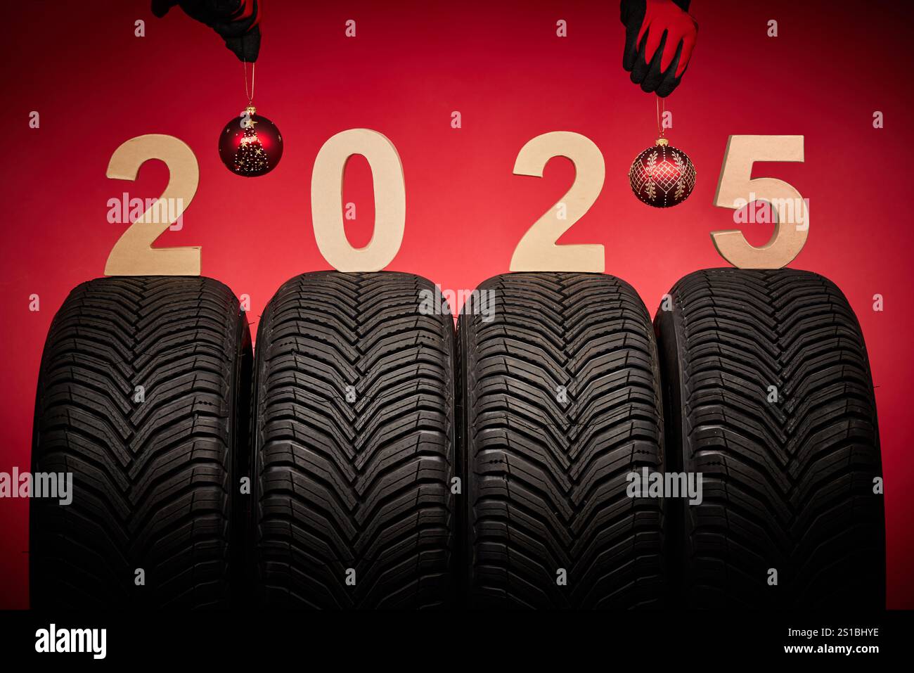 Winter car tires, big wheels service and hands of mechanics with ...