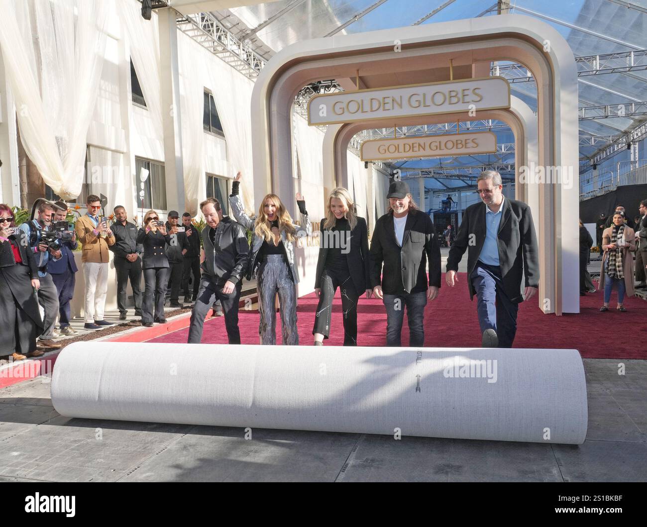 (L-R) Barry Adelman, Nikki Glaser, President of the Golden Globes Helen ...
