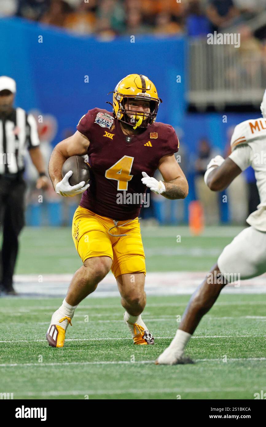 ATLANTA, GA - JANUARY 01: Running Back Cam Skattebo #4 of the Arizona ...