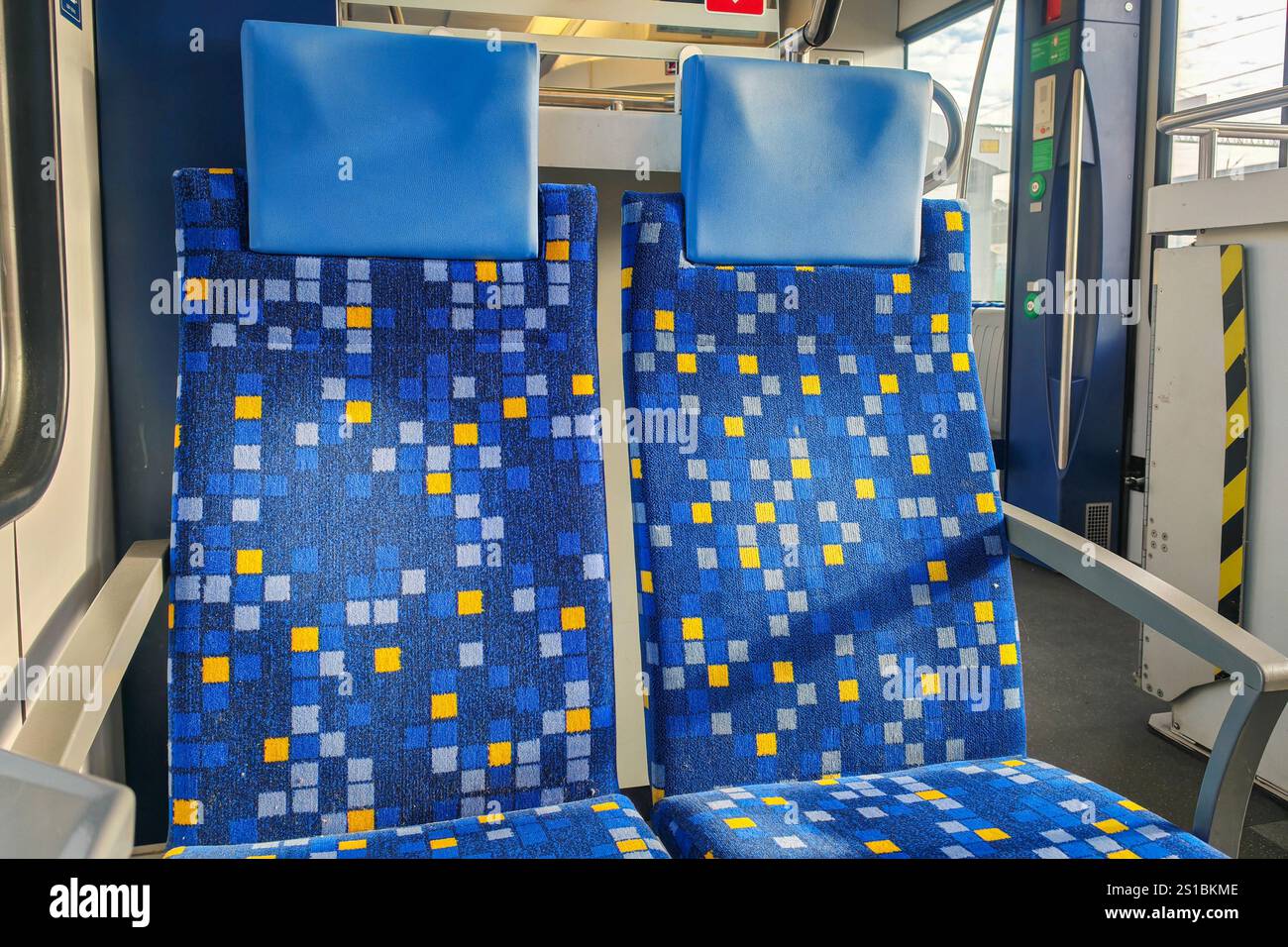 Modern train seats with patterned material in a Hungarian railway car ...