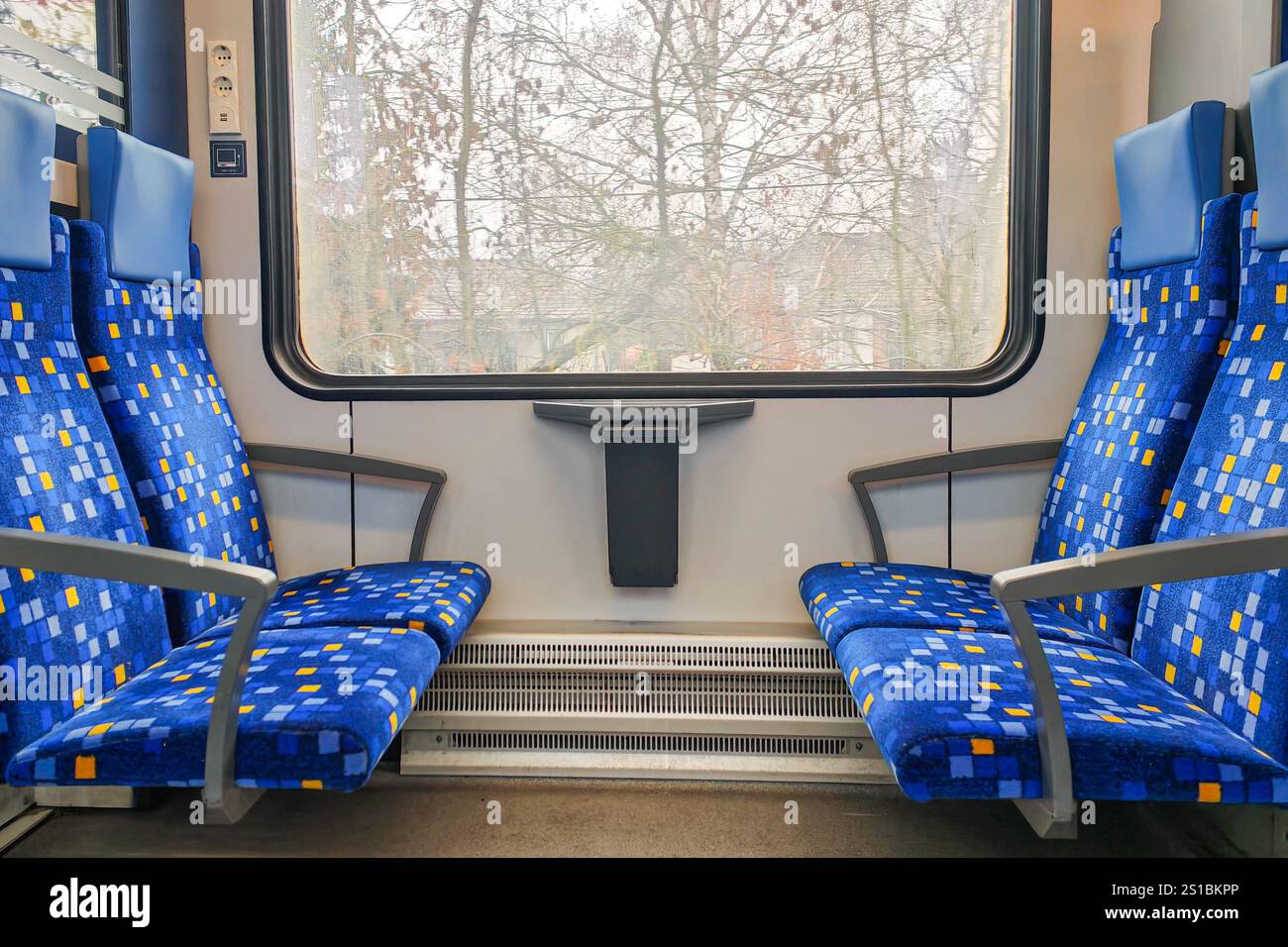 Modern train seats with patterned material in a Hungarian railway car ...