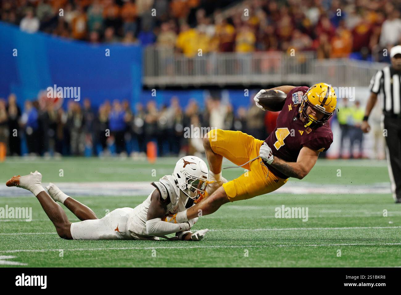 ATLANTA, GA - JANUARY 01: Running Back Cam Skattebo #4 of the Arizona ...