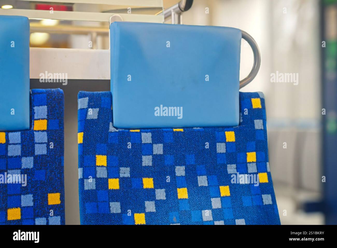 Modern train seats with patterned material in a Hungarian railway car ...