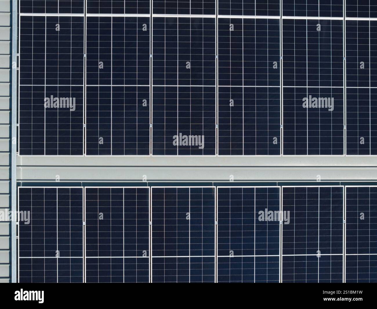 close up solar panels cells , in top of a building rood, top down view ...