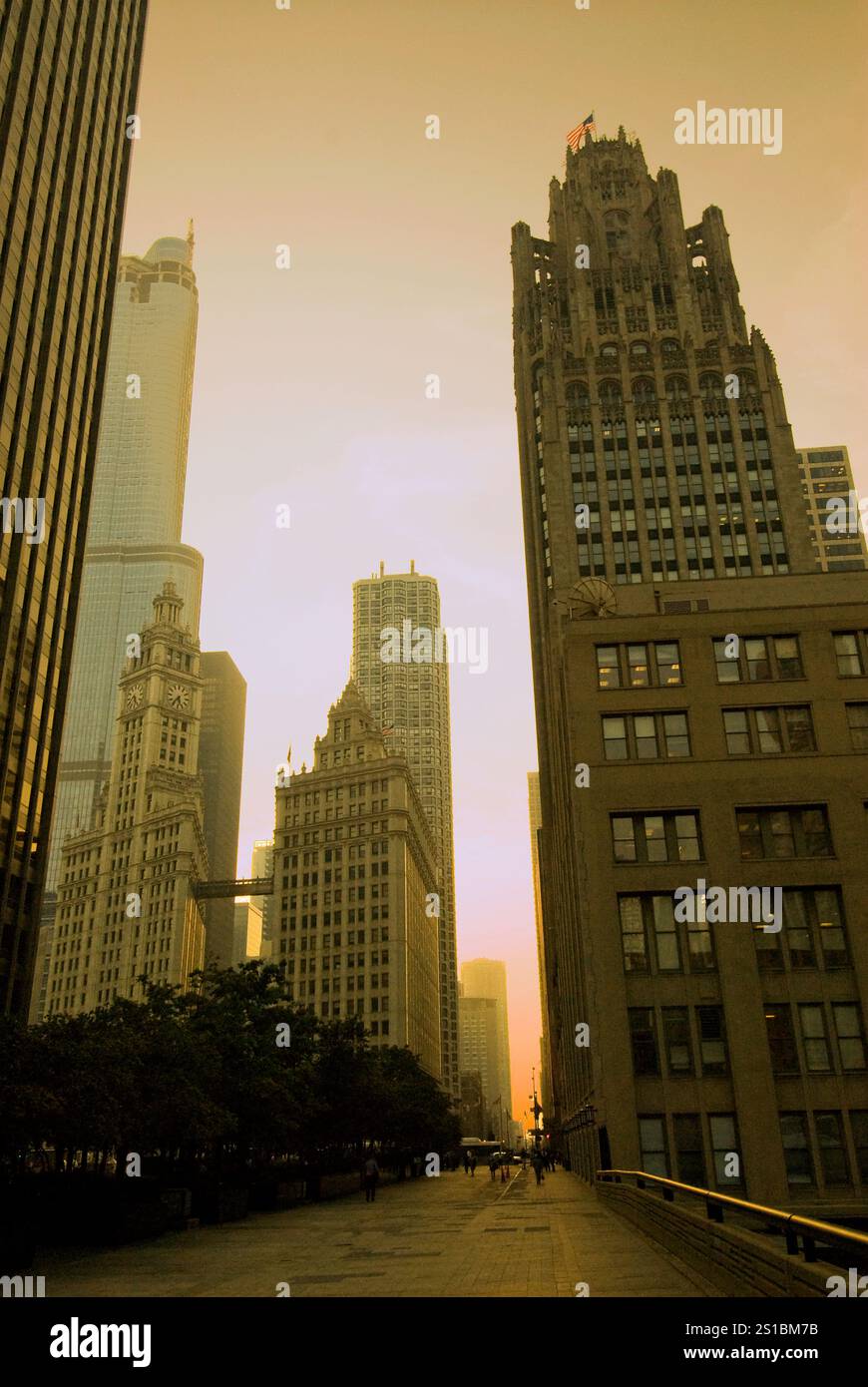 dusk - Wrigley Building built 1924 background left and Tribune Tower ...