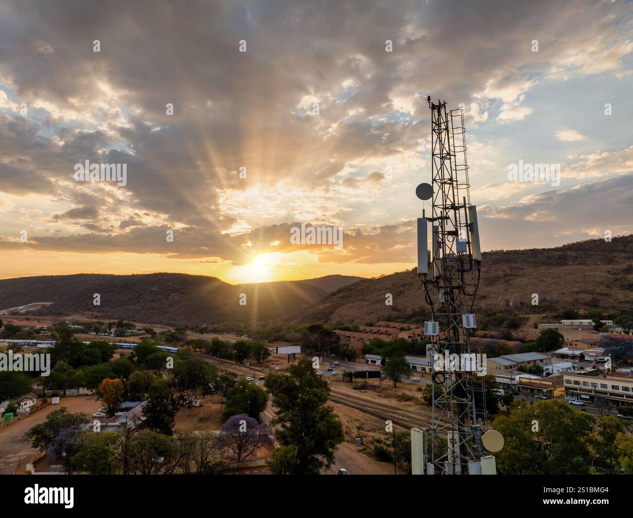aerial view, cellular antenna at sunset, communications tower, mountain range Stock Photo - Alamy