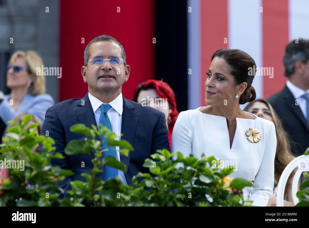 Outgoing Governor Pedro Pierluisi sits with his wife Fabiola Ansotegui ...