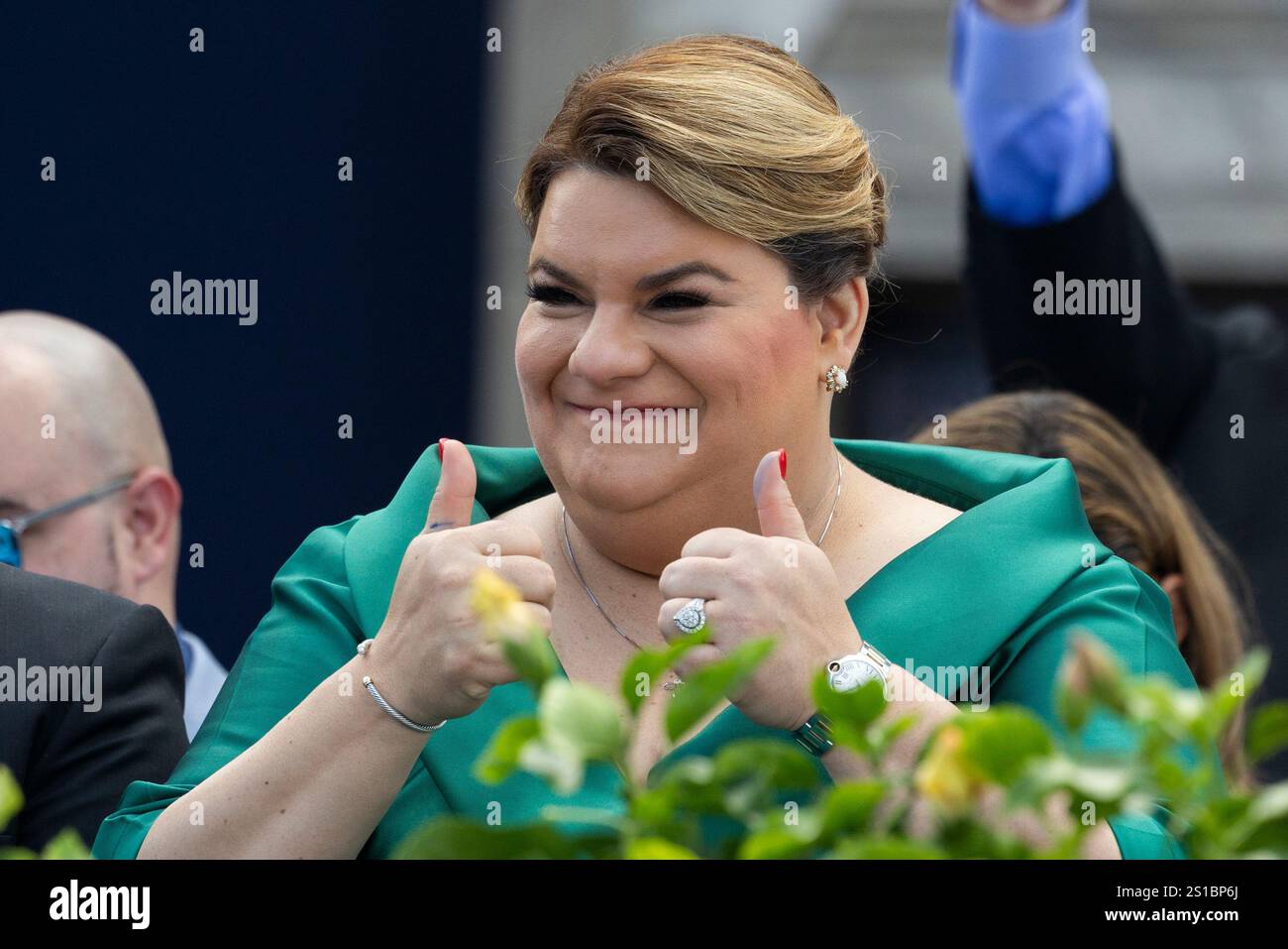 Jenniffer Gonzalez Colon gives a thumbs up during her swearing-in ...