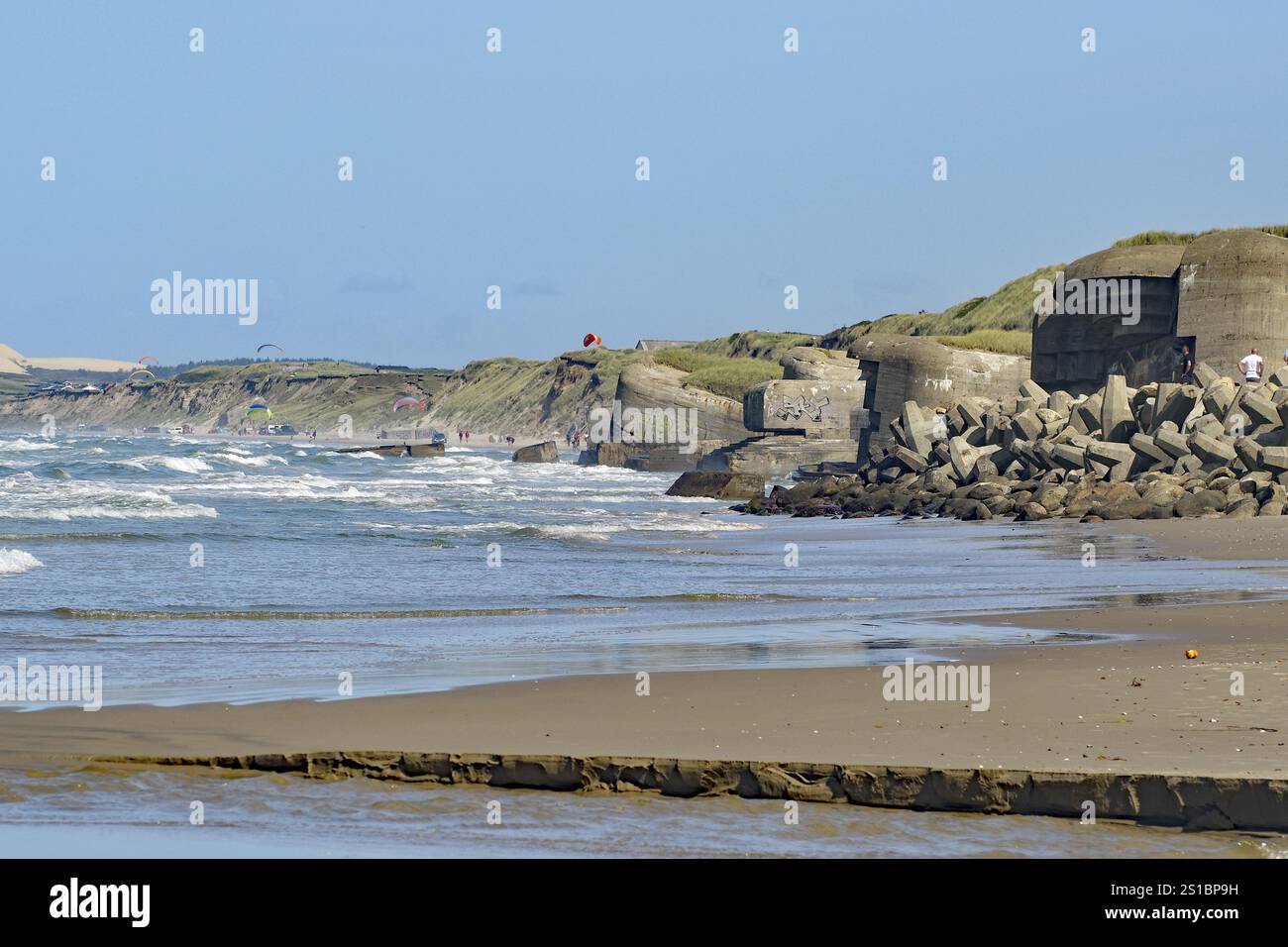 Concrete bunker on the beach with a view of the sea and the waves ...