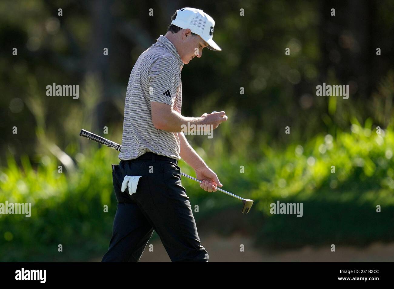 Matt McCarty looks at his ball on the fourth green during the first ...