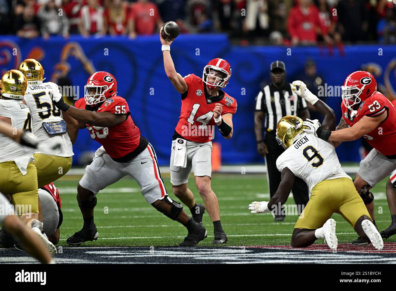 Georgia quarterback Gunner Stockton (14) throws a pass during the first ...