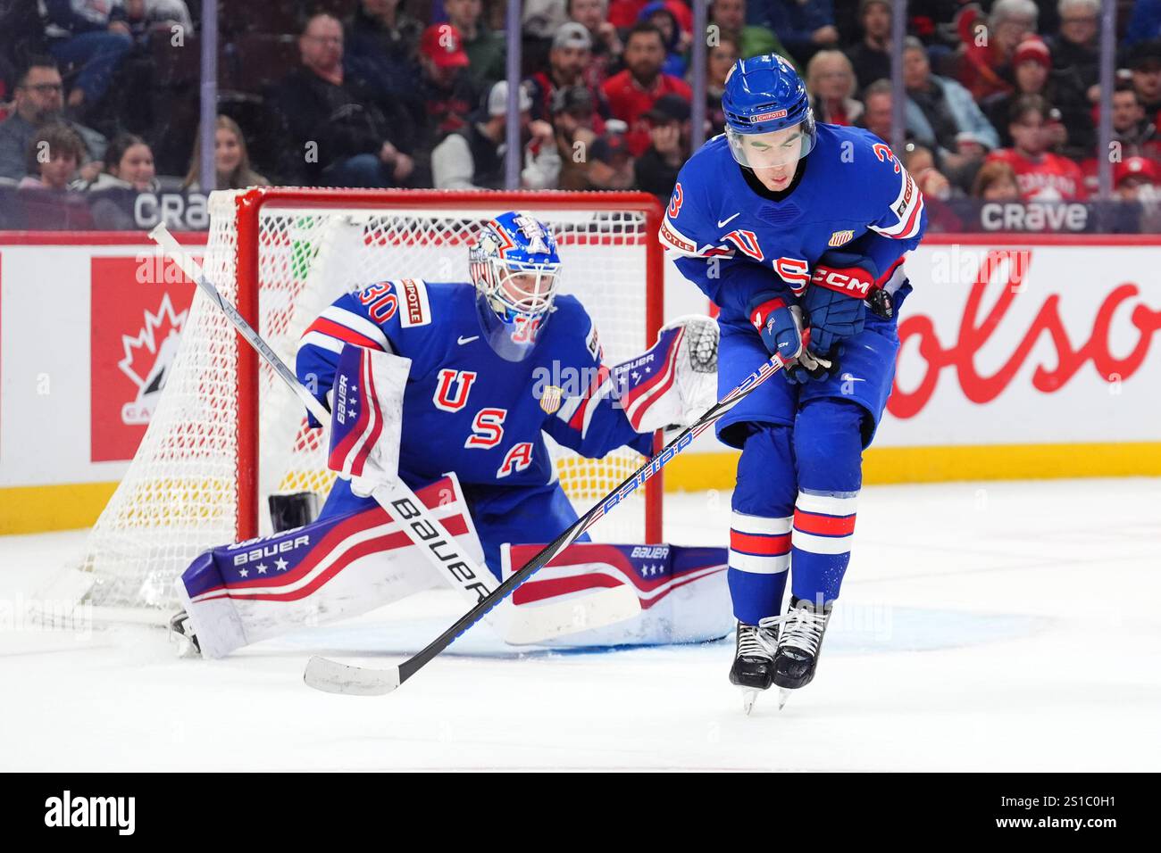 Ottawa, Canada. 02nd Jan, 2025. USA defenceman Logan Hensler (3) reacts ...