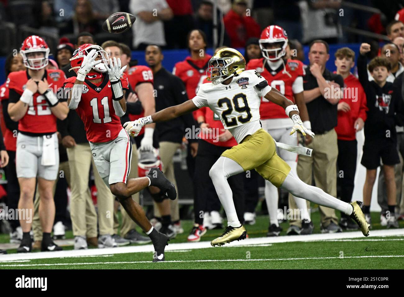 Georgia wide receiver Arian Smith (11) catches a pass ahead of Notre ...
