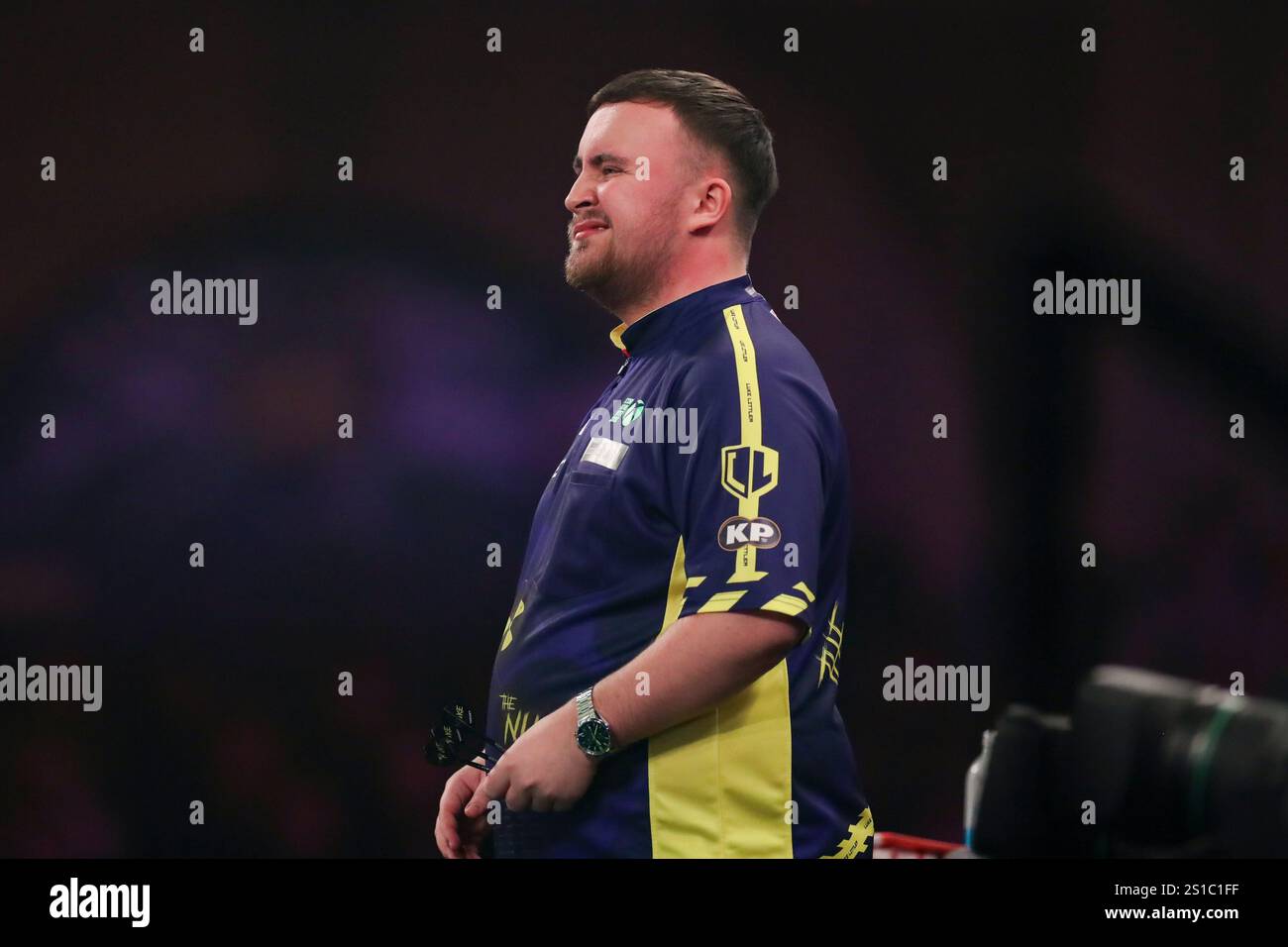 Luke Littler reacts during the Paddy Power World Darts Championship ...