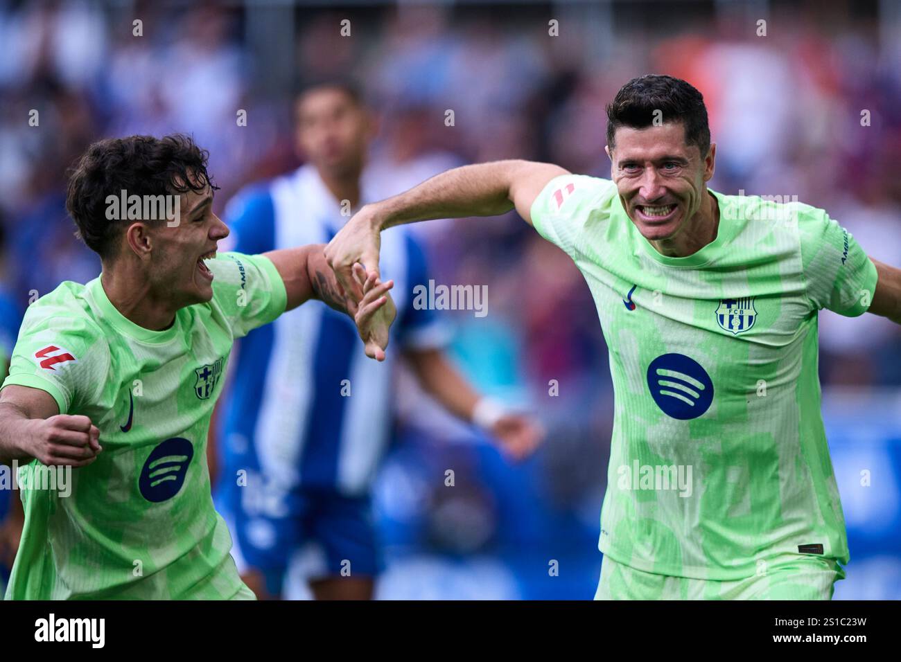 Robert Lewandowski of FC Barcelona celebrates with his teammate Hector ...