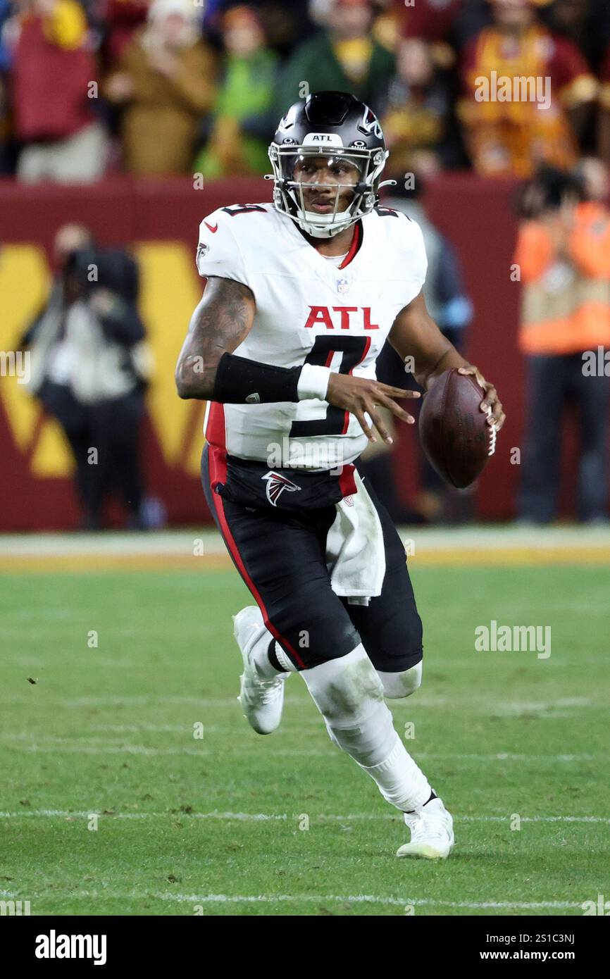 Atlanta Falcons quarterback Michael Penix Jr. (9) runs with the ball ...