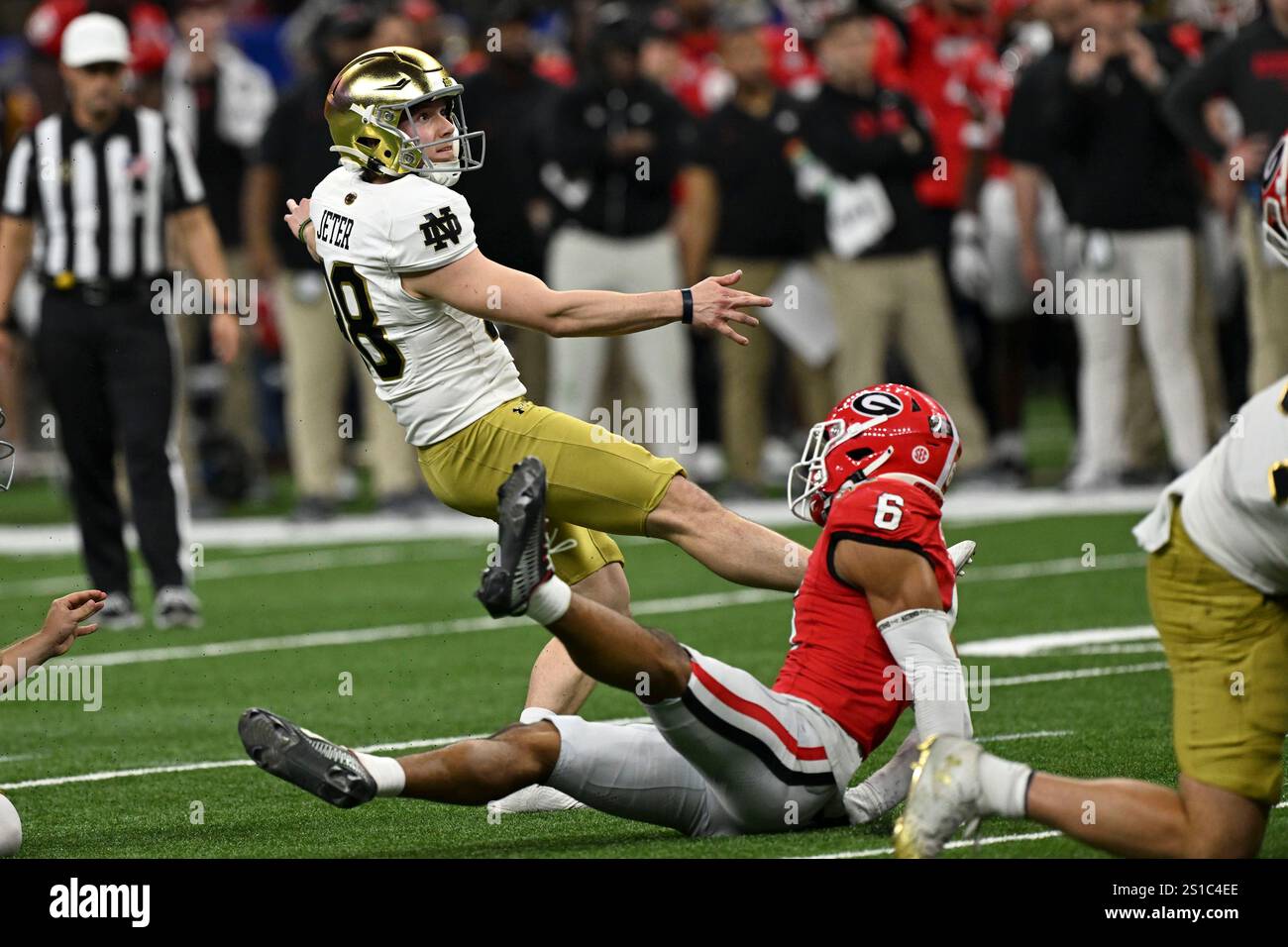 Notre Dame place kicker Mitch Jeter (98) kicks a 48-yard field goal ...