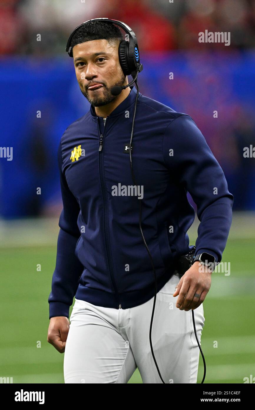 Notre Dame head coach Marcus Freeman watches from the sideline during the first half against ...