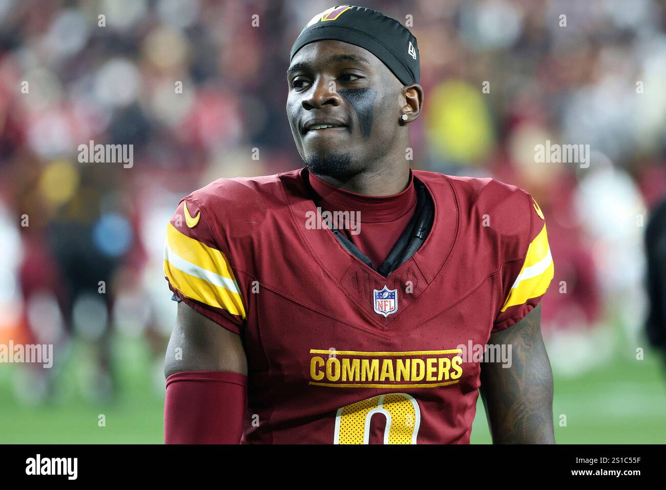 Washington Commanders cornerback Mike Sainristil (0) walks off the ...
