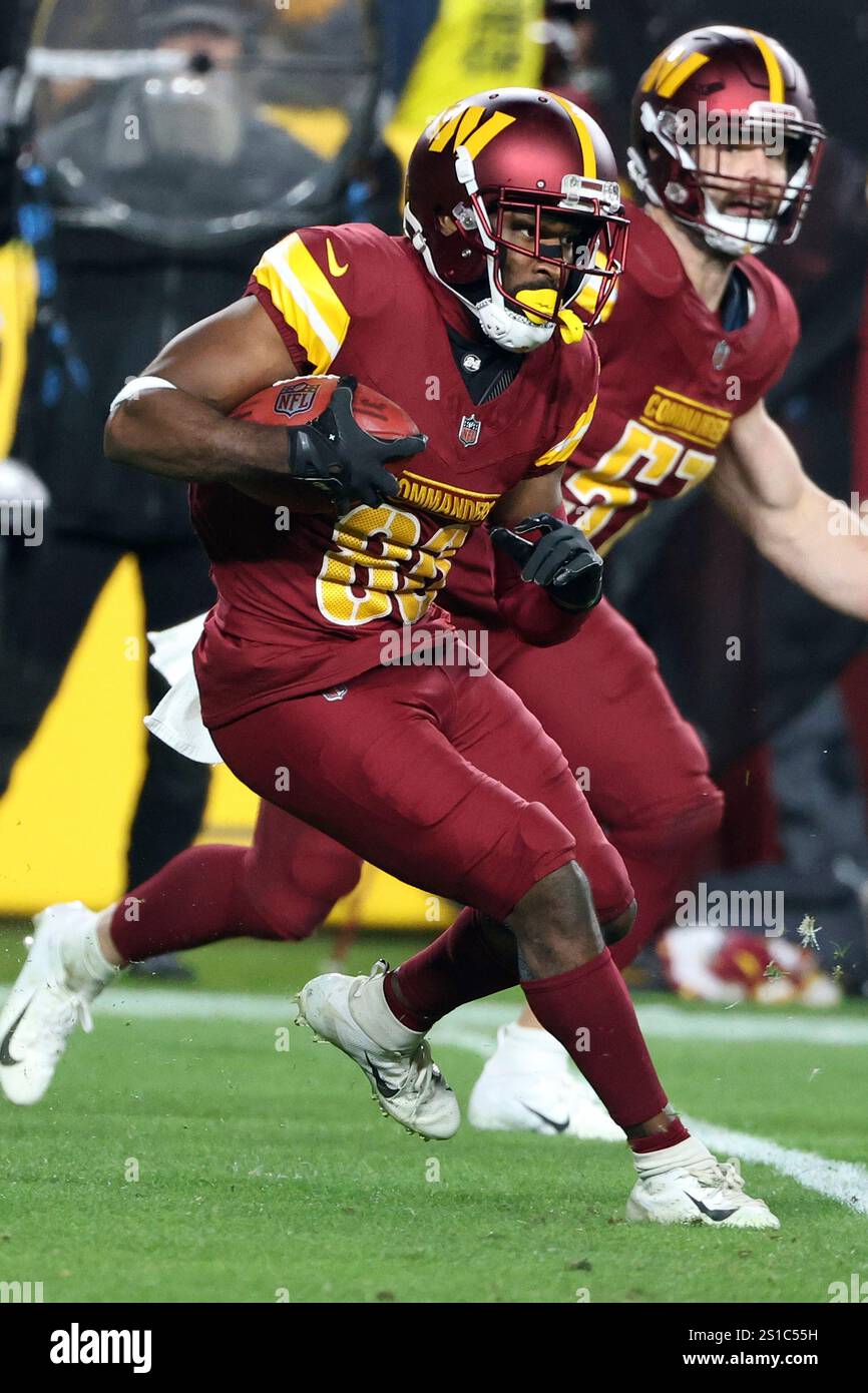 Washington Commanders wide receiver Jamison Crowder (80) runs with the ...
