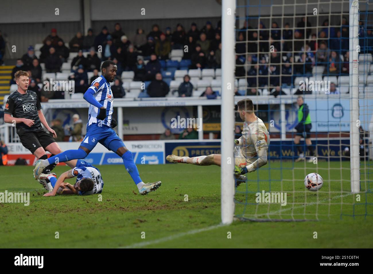 Hartlepool United's Mani Dieseruvwe watches Hartlepool United's Luke ...