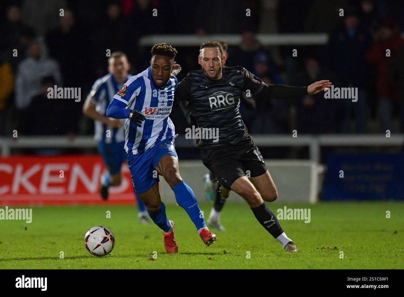 Hartlepool United's Kazenga LuaLua and Oldham Athletic's Dan Gardner ...